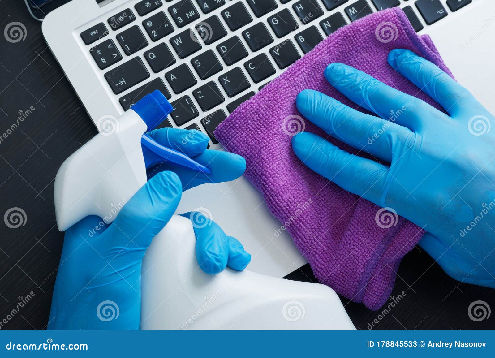 Male Hand in Blue Glove Holding Microfiber Cleaning Cloth and Spray ...
