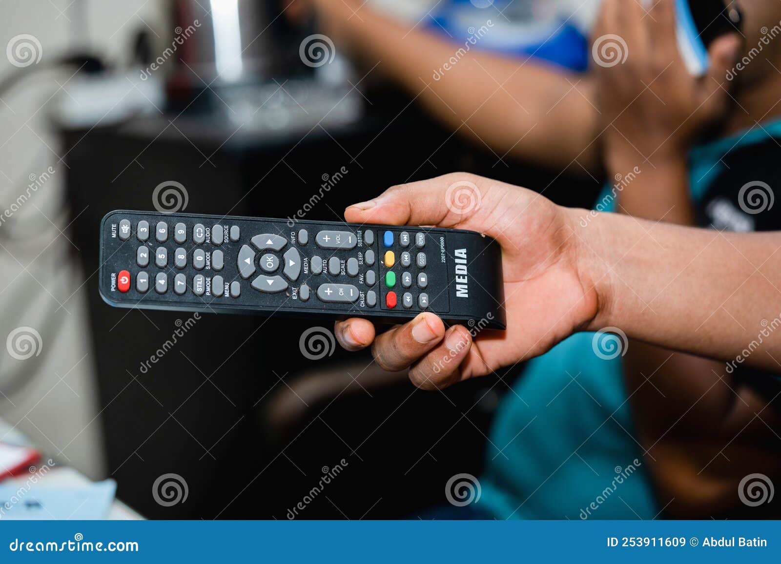 Male Hand Changing Channel with Remote Control Isolated Stock Image ...