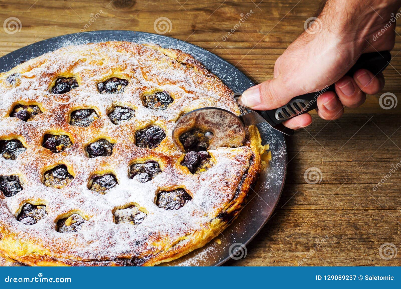 Male Cutting Sweet Pie with a Roller Cutter Stock Image - Image of cake ...