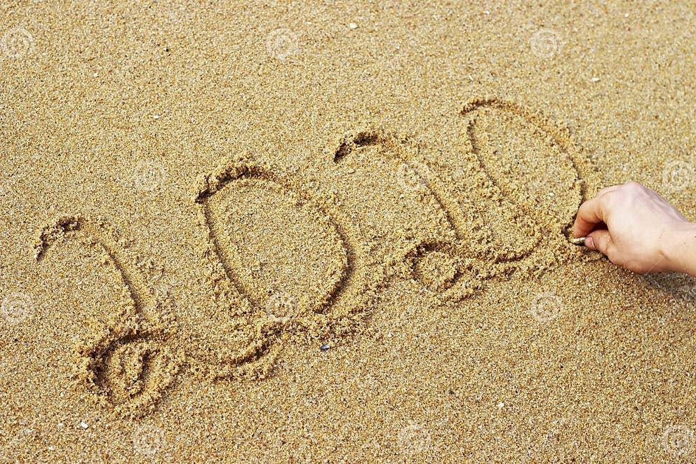 Male Hand Draws on Sand 2020 Year, Top View Stock Photo - Image of hand ... Male Hand Draws on Sand 2020 Year, Top View Stock Photo - Image of hand ...