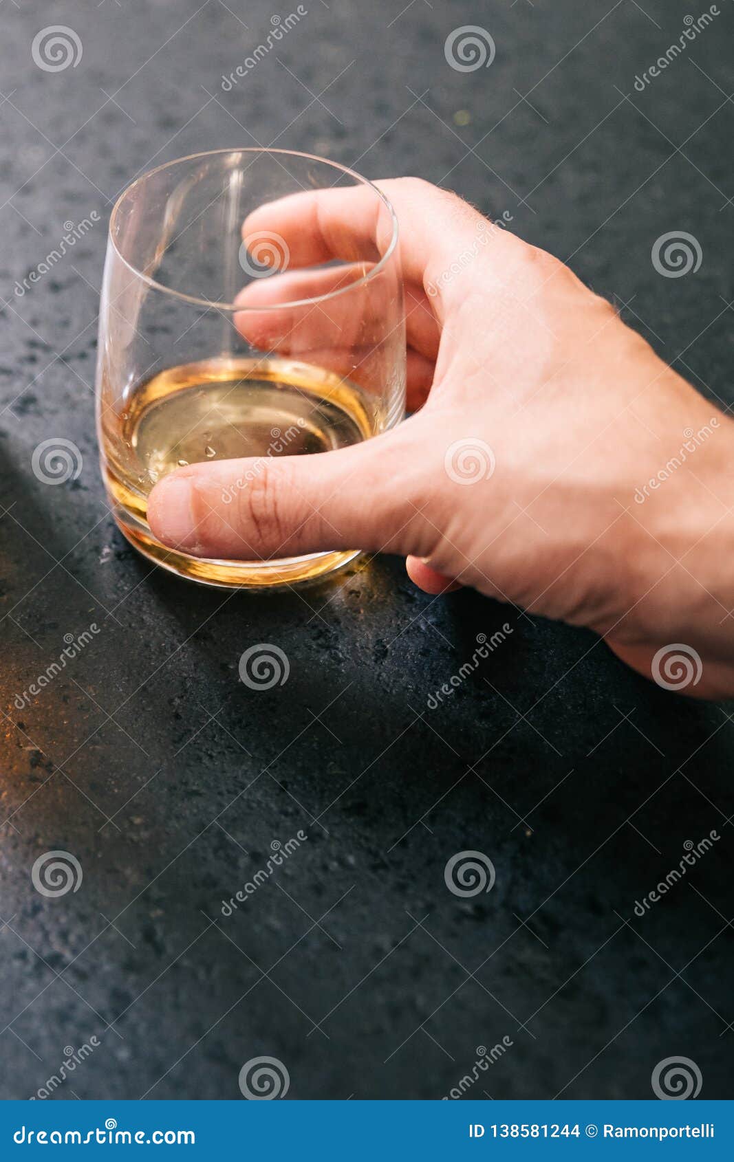 Male Hand Grasping a Glass with Whisky Stock Photo - Image of table ...