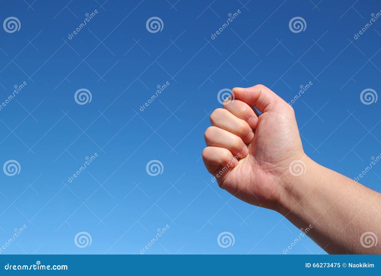 Male Hand Grip Gesture in the Blue Sky Stock Image - Image of grab ...
