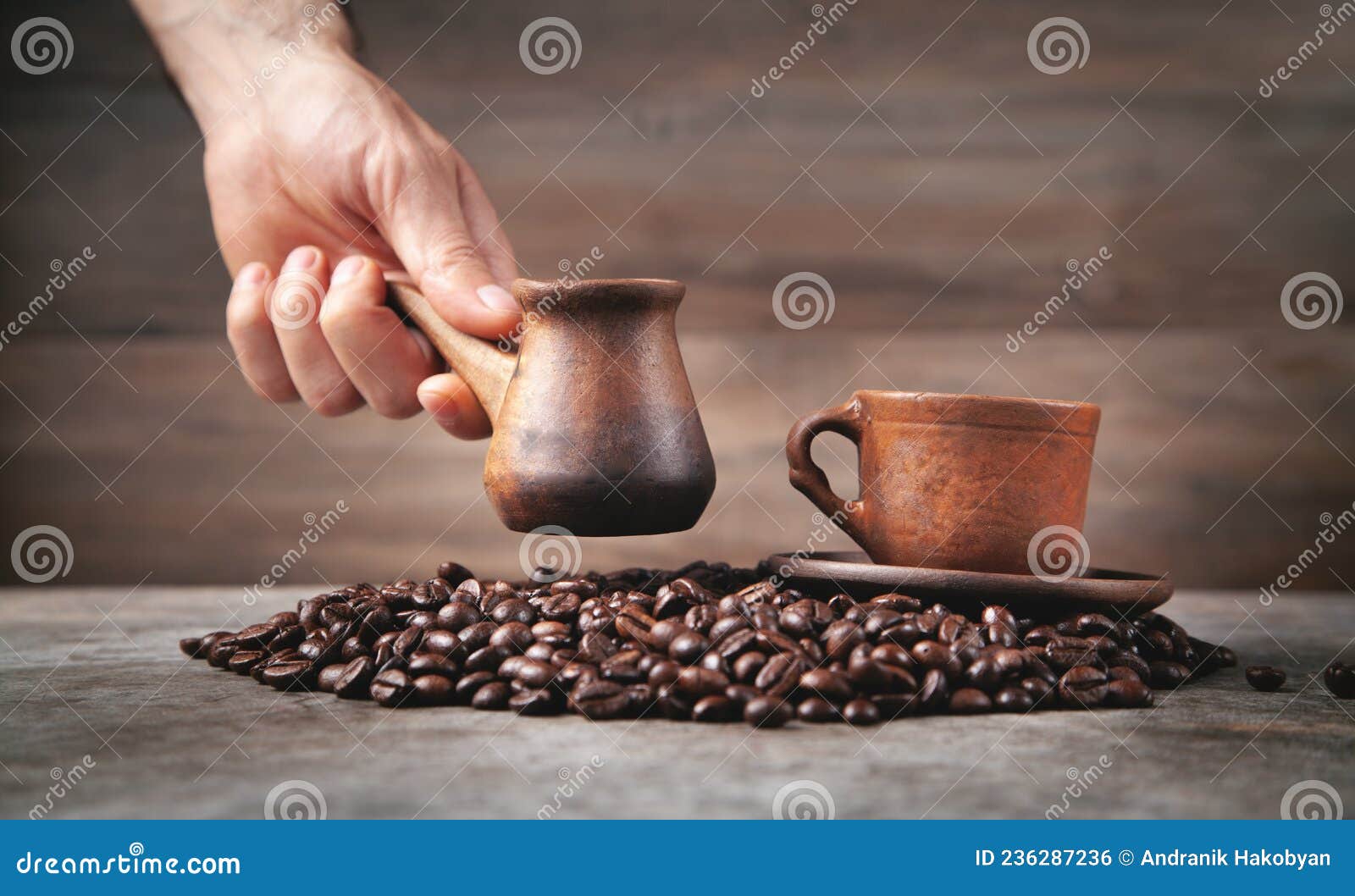 Male Hand Holding Coffee Pot Stock Photo - Image of hand, home: 236287236