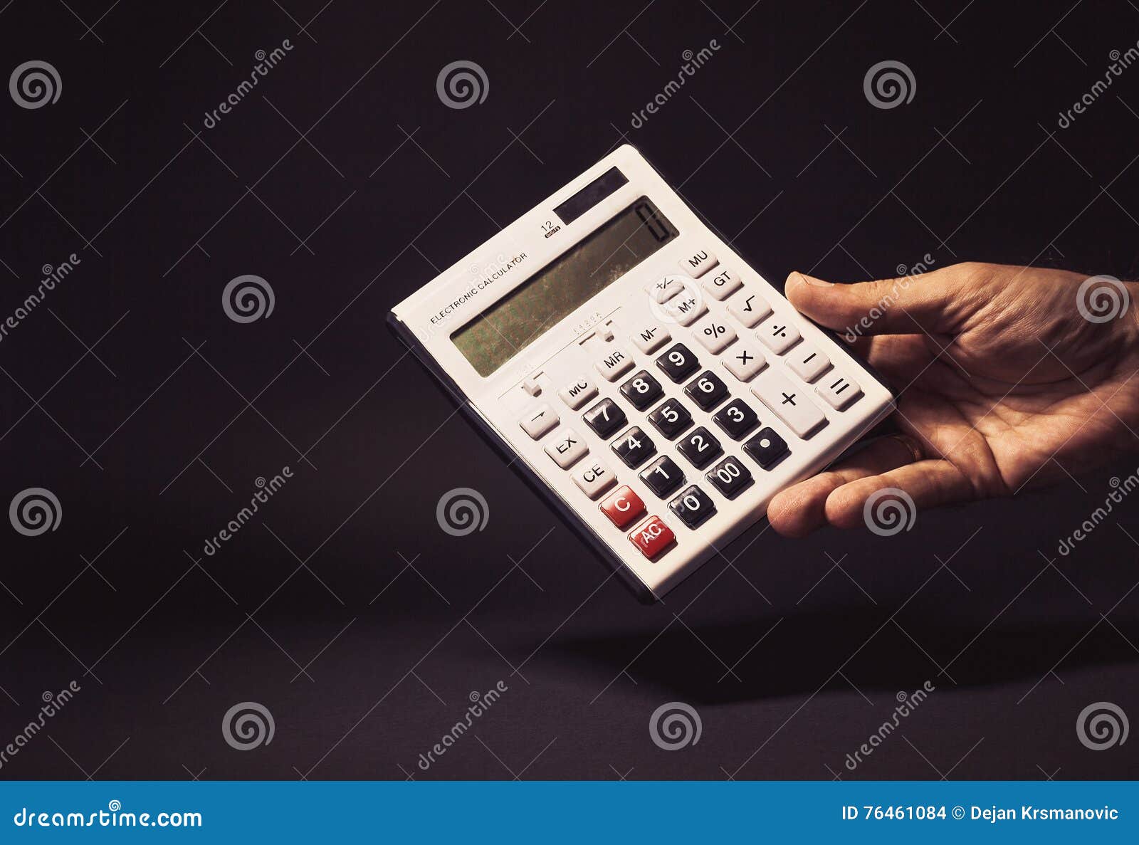 Male Hand Holding a Electronic Calculator Stock Photo - Image of device ...