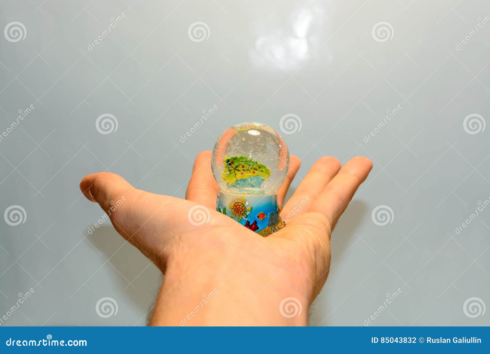Male Hand Holding Glass Sphere Stock Photo - Image of business, fingers ...