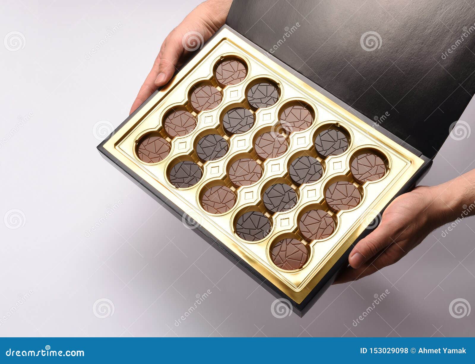 Male Hand Holding Chocolate Box Stock Photo - Image of shot, holding ...