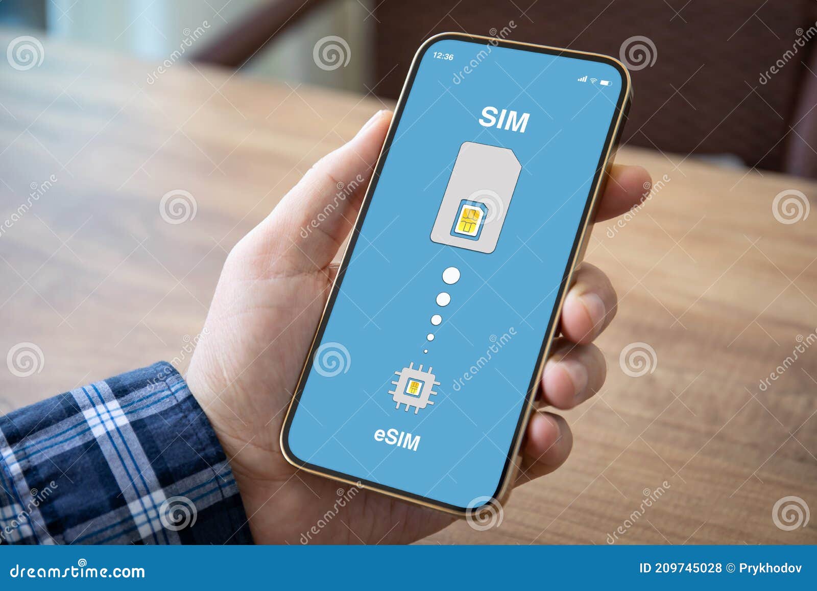 Male Hand Holding Phone with Sim Card Replacement on ESim Stock Photo ...