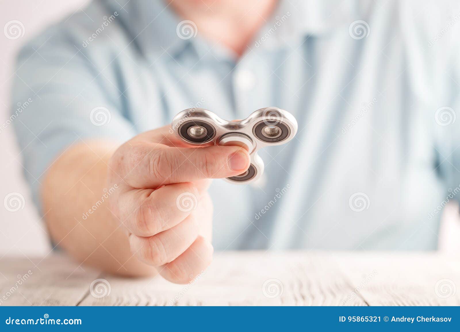 Male Hand Holding Popular Fidget Spinner Toy Stock Image - Image of ...
