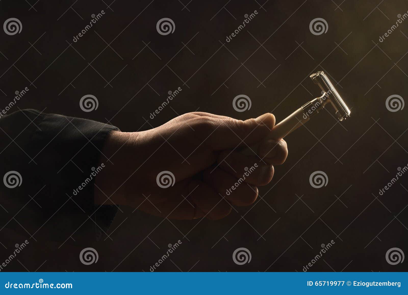 Male Hand Holding Safety Razor Stock Image - Image of hair, dark: 65719977