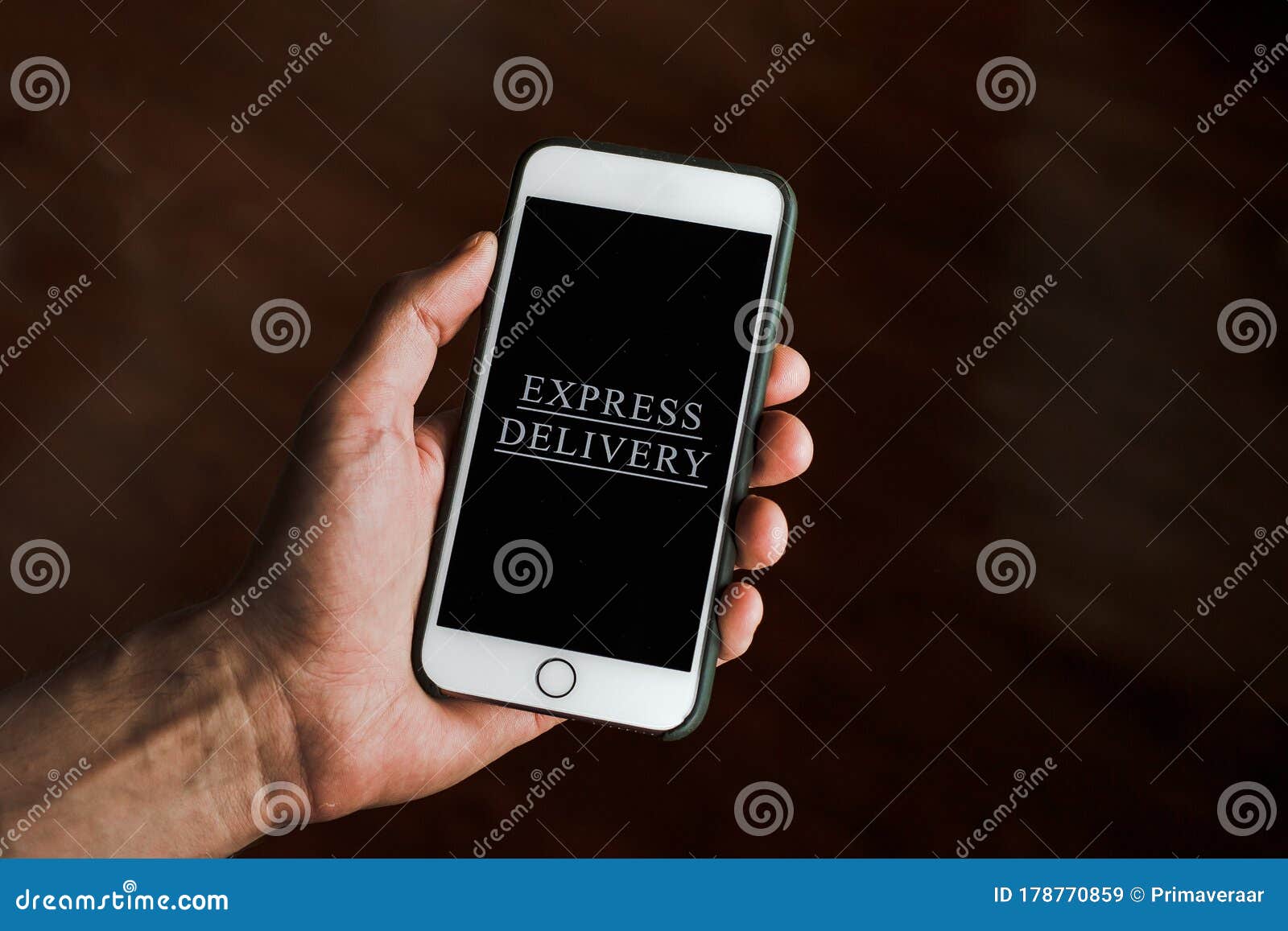 Hand Holds a Smartphone with the Words Express Delivery Stock Image ...
