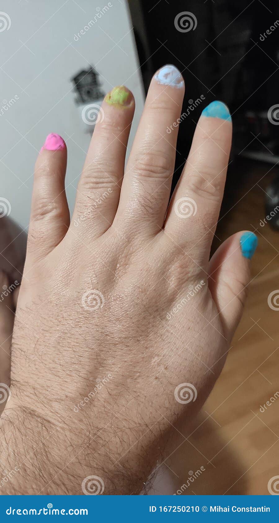 Male hand painted nails stock photo. Image of painted - 167250210