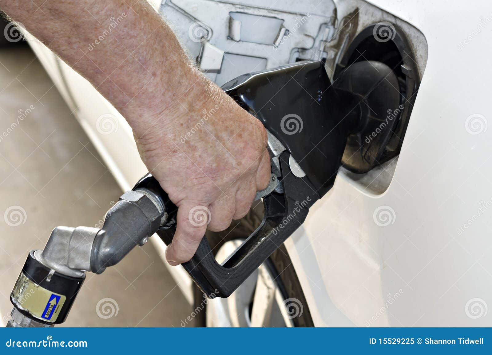 Male hand pumping gas stock image. Image of pollution - 15529225