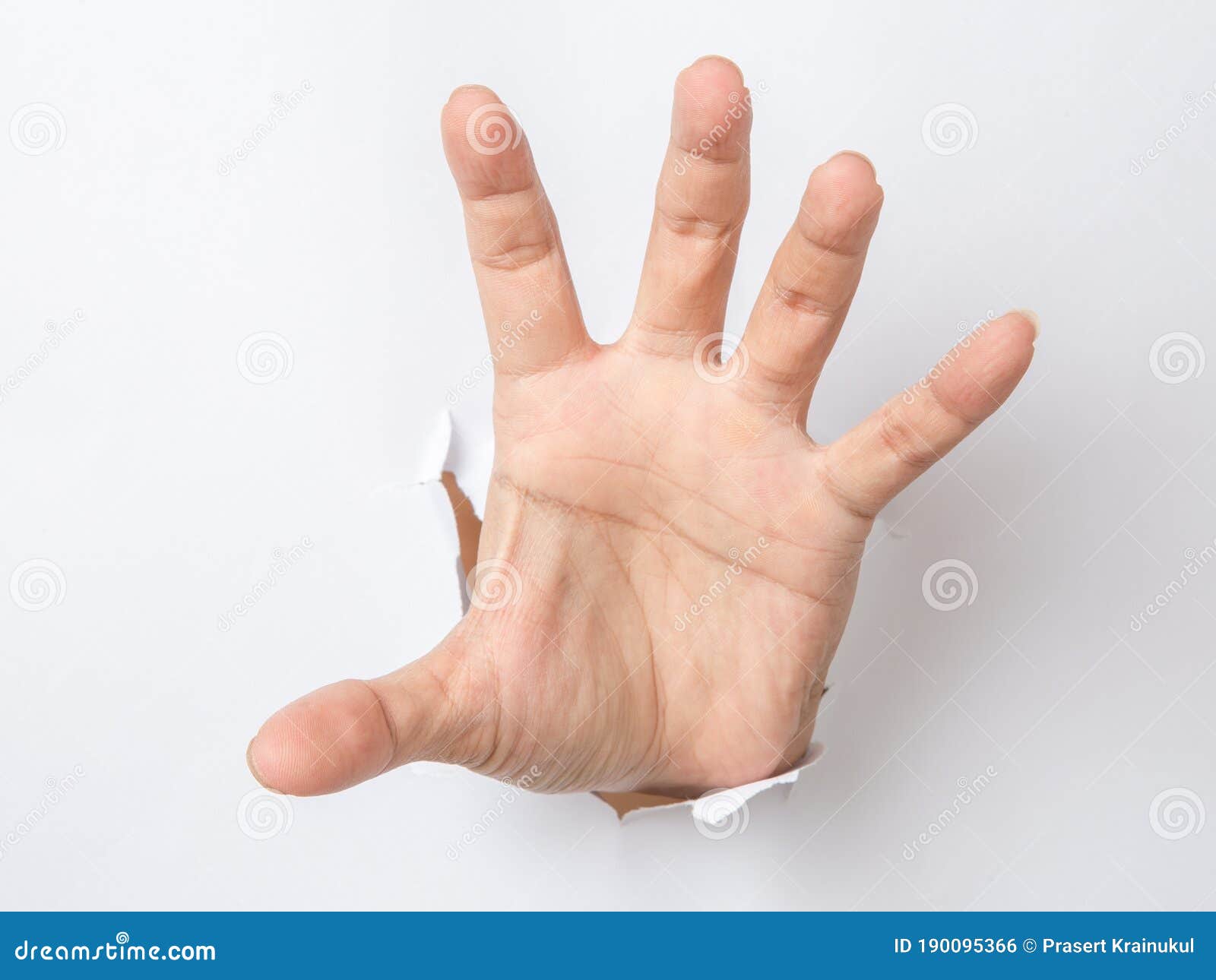 Male Hand Punching through the Paper Stock Photo - Image of paper, torn ...