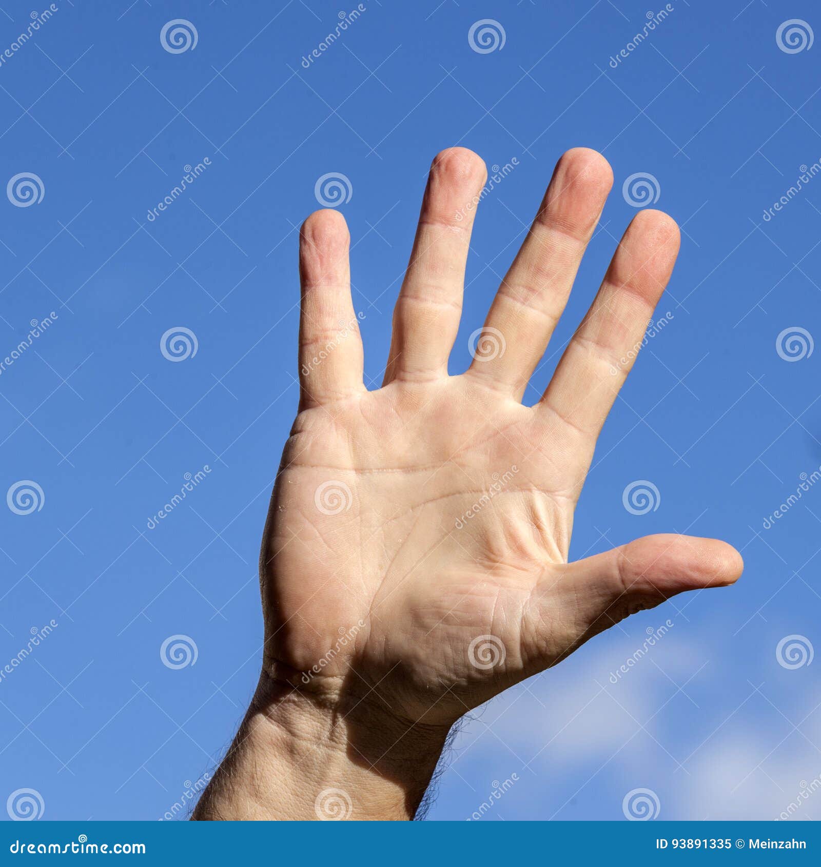 Male Hand Rised Against Blue Sky Stock Image - Image of people ...