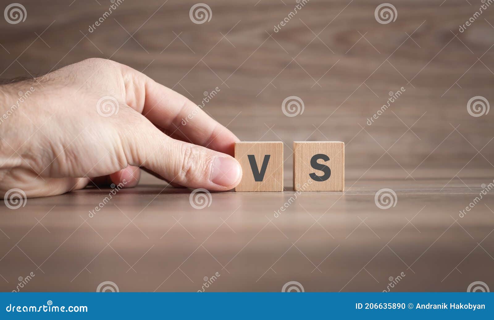 Male Hand Showing VS Word on Wooden Cube Stock Photo - Image of word ...