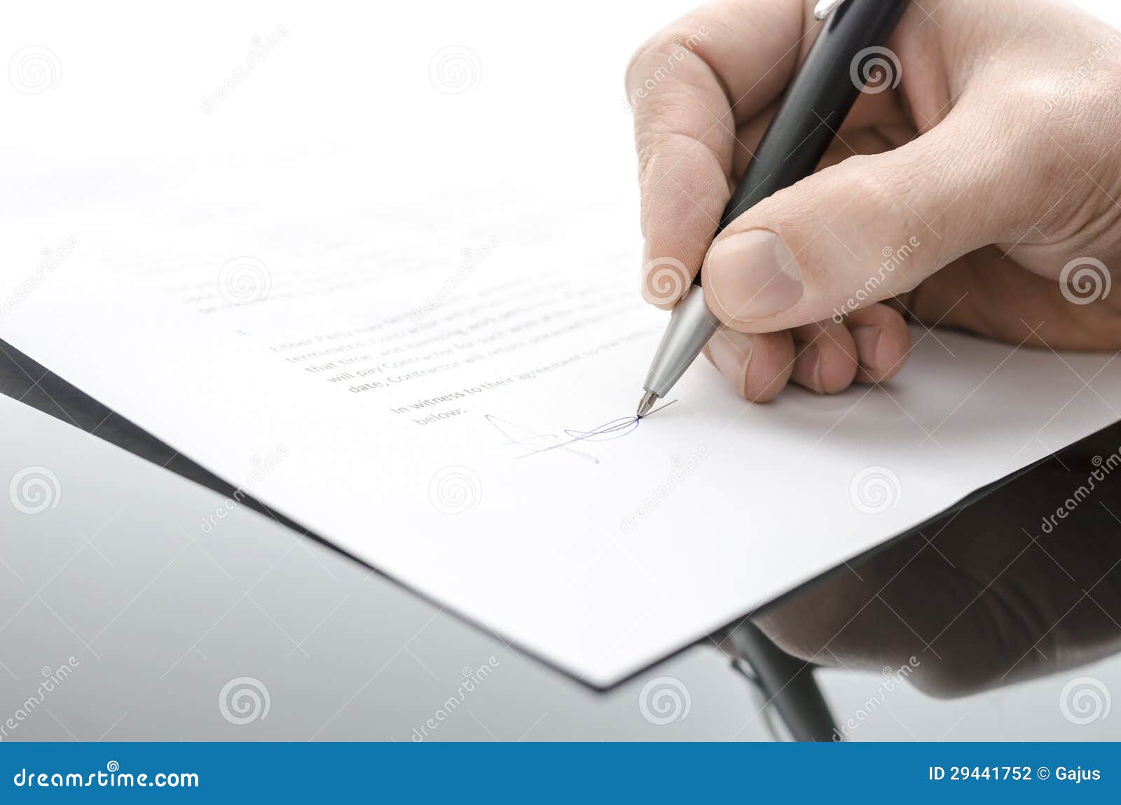 Male Hand Signing a Contract on a Black Table Stock Photo - Image of ...