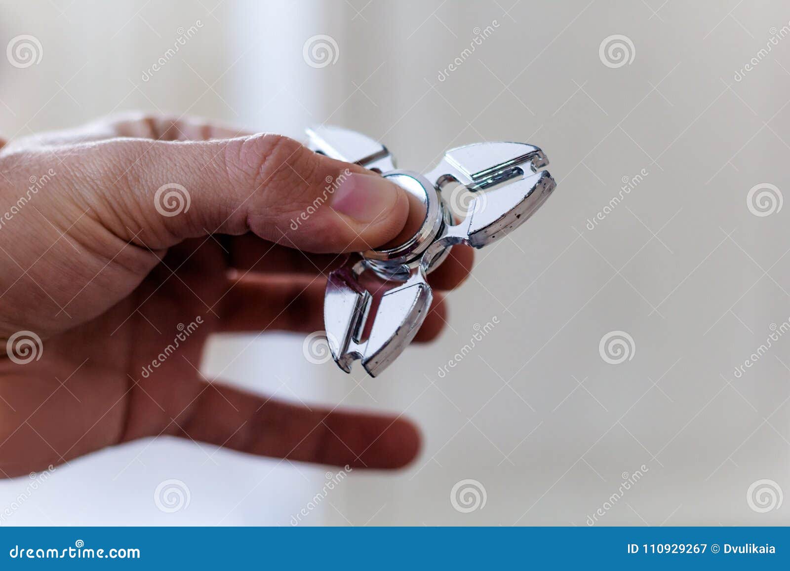 Male hand with spinner stock image. Image of fidget - 110929267