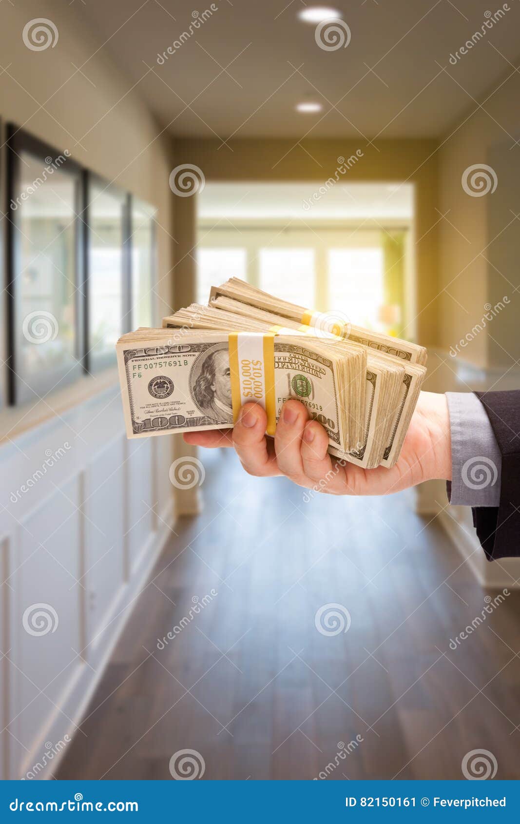 Male Hand with Stack of Cash Inside Hallway of House Stock Image ...