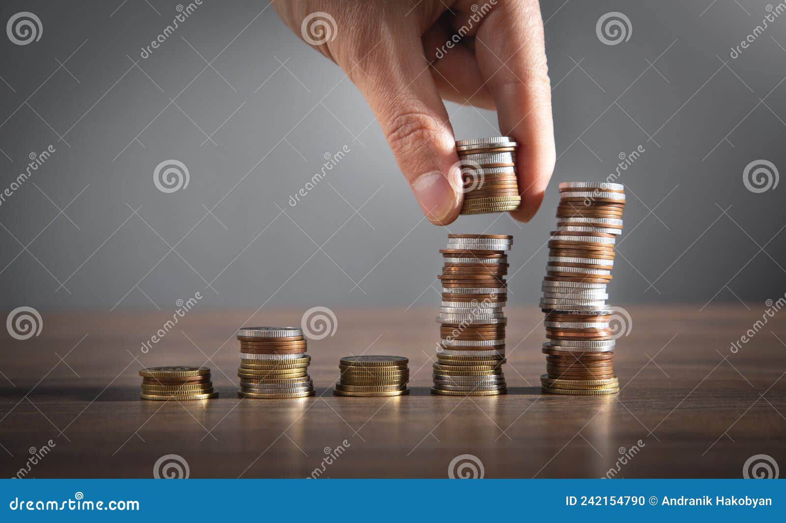 Male Hand Stacking Coins. Saving Money Stock Photo - Image of saving ...