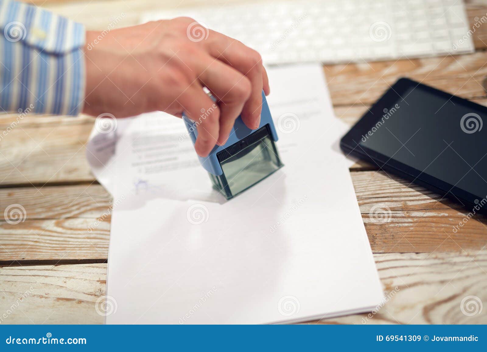 Male Hand Stamping Document Stock Image - Image of lawyer, letter: 69541309