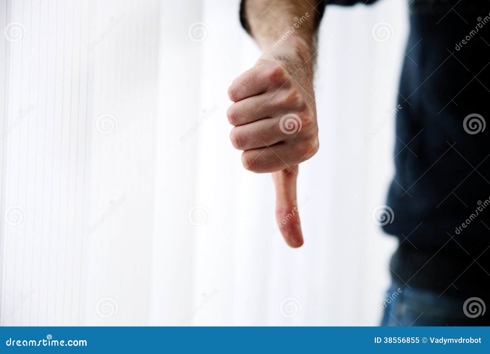 Male hand with thumb down stock image. Image of expression - 38556855