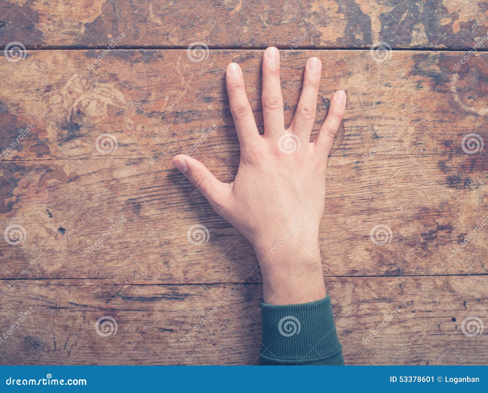 Male Hand on a Wooden Table Stock Image - Image of young, table: 53378601