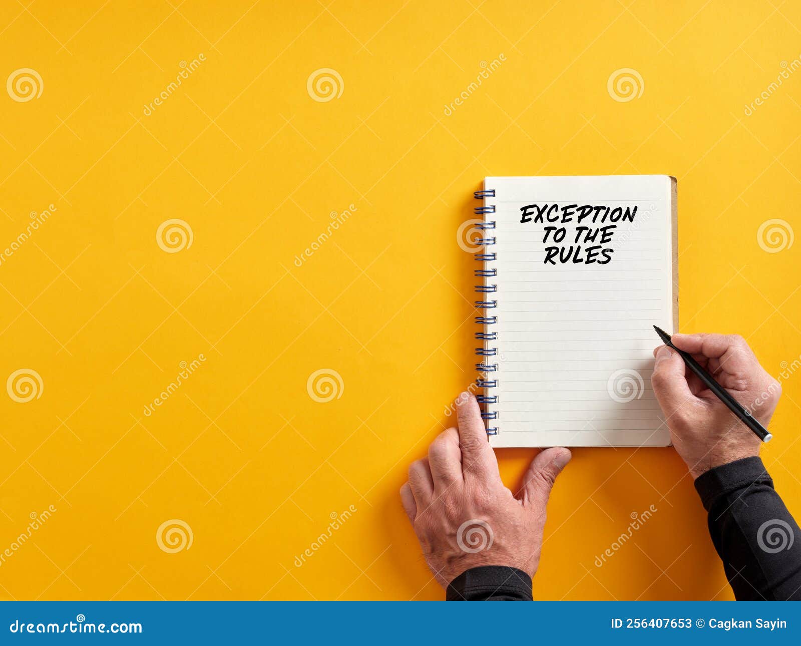Male Hand Writing Exception To the Rules on a Notepad. Exclusion from ...