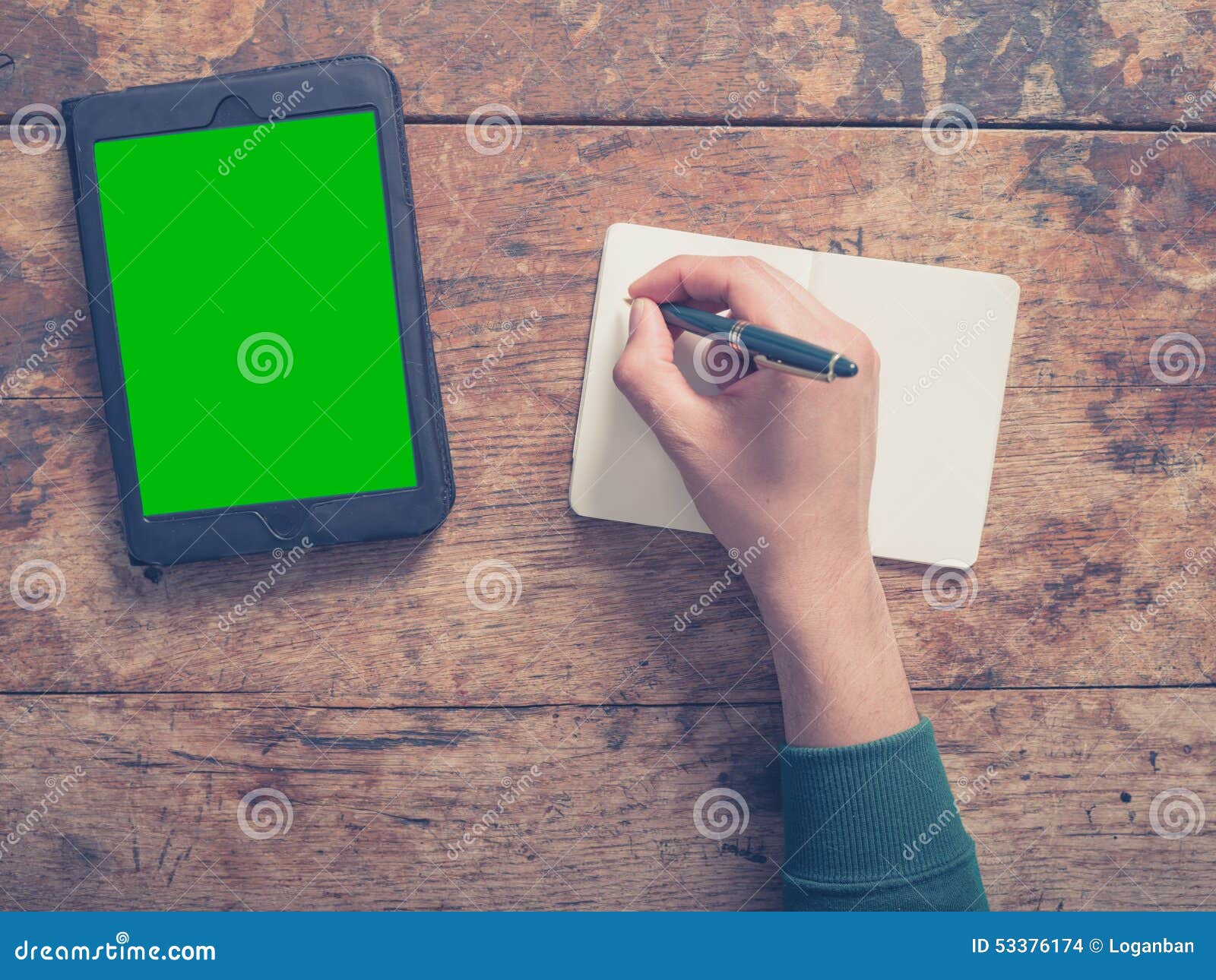 Male Hand Writing in Notepad and Using Tablet Stock Photo - Image of ...