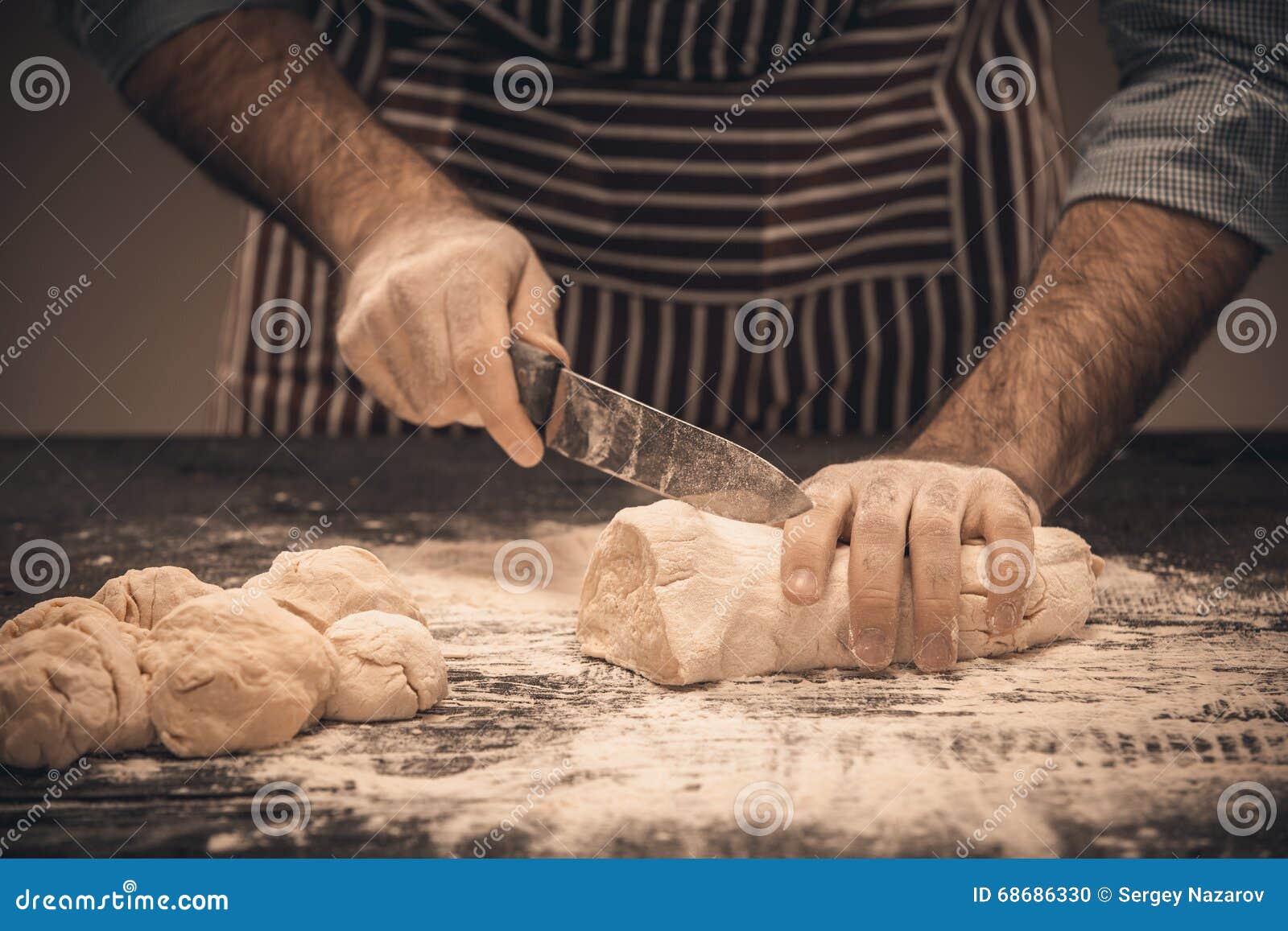 Male hands cut the dough. stock photo. Image of hands - 68686330