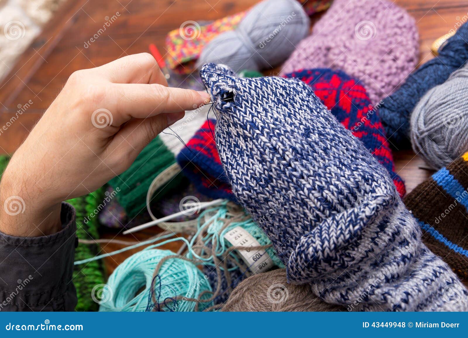 Male hands darn wool socks stock photo. Image of male - 43449948