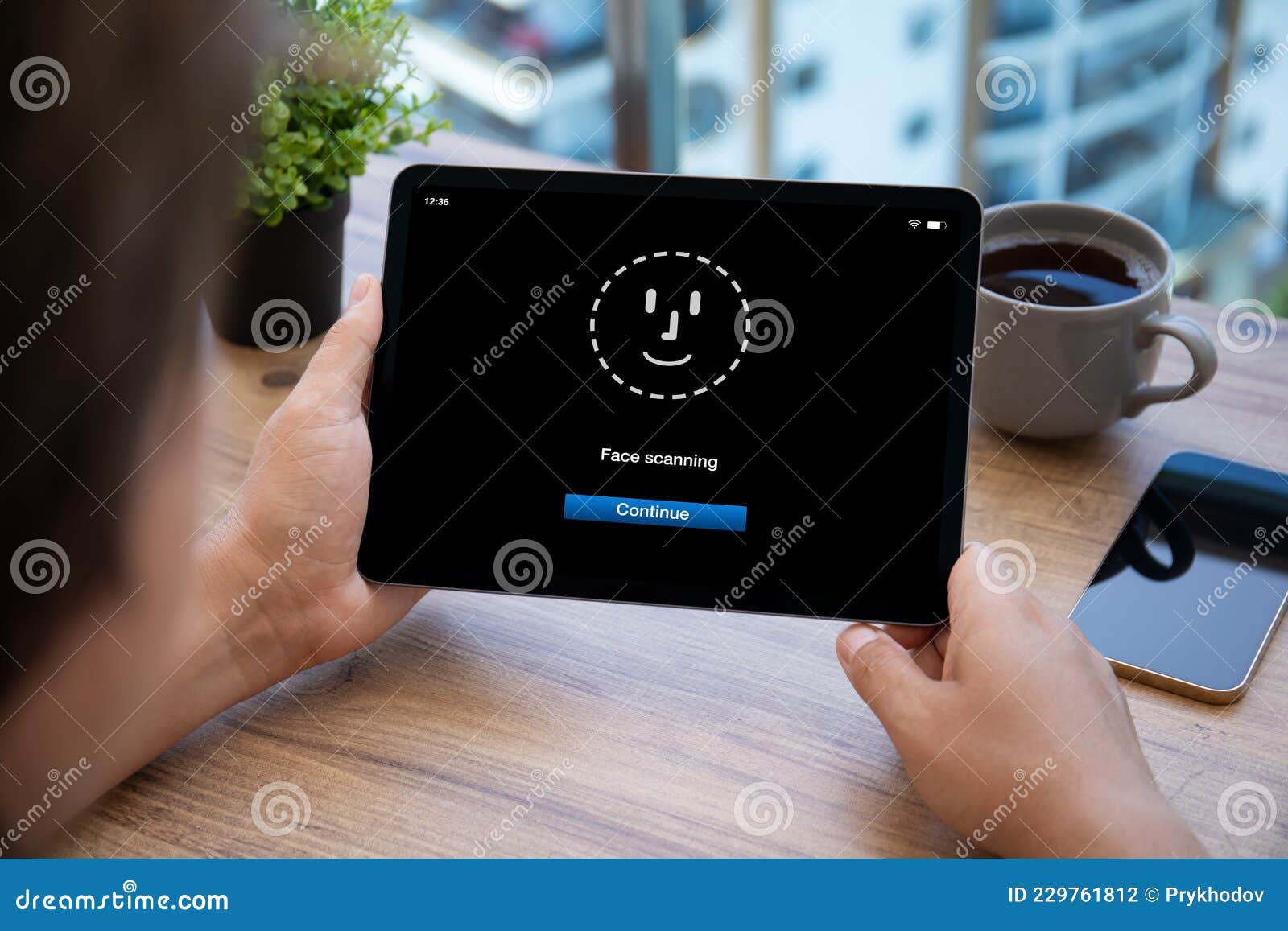 Male Hands Holding Computer Tablet Face Scanning Application on Screen ...