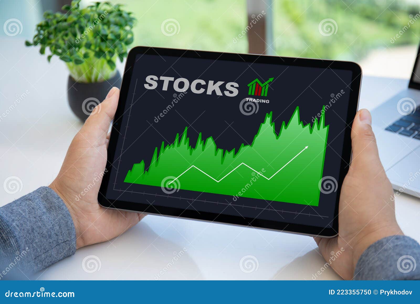 Male Hands Holding Computer Tablet with Stocks Trading App Stock Photo ...