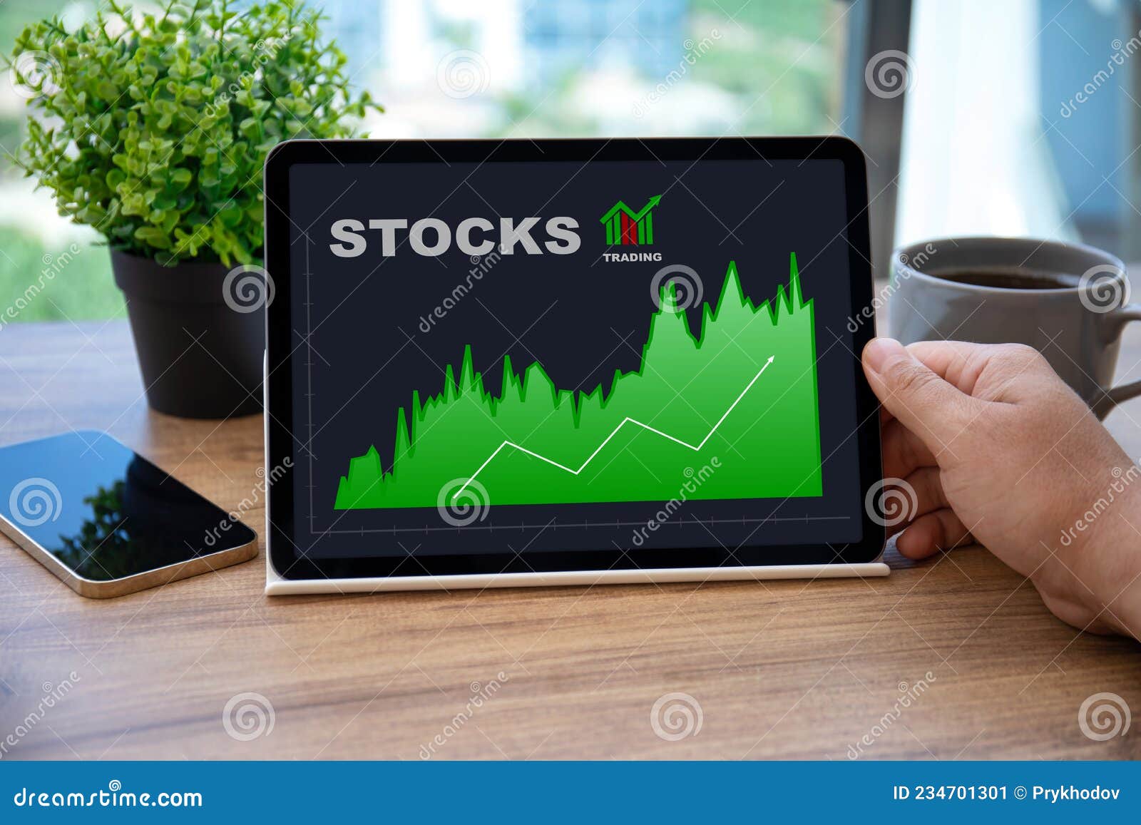 Male Hands Holding Computer Tablet with Stocks Trading App Stock Image ...