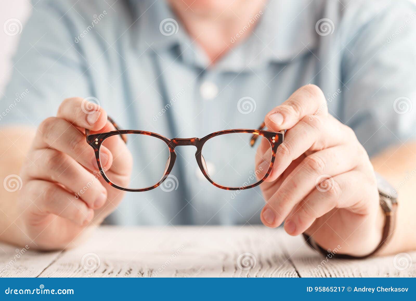 Male Hands Holding a Pair of Glasses Stock Image - Image of eyewear ...