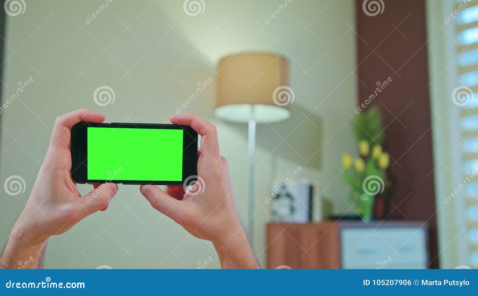 Male Hands Holding a Phone with a Green Screen Stock Photo - Image of ...