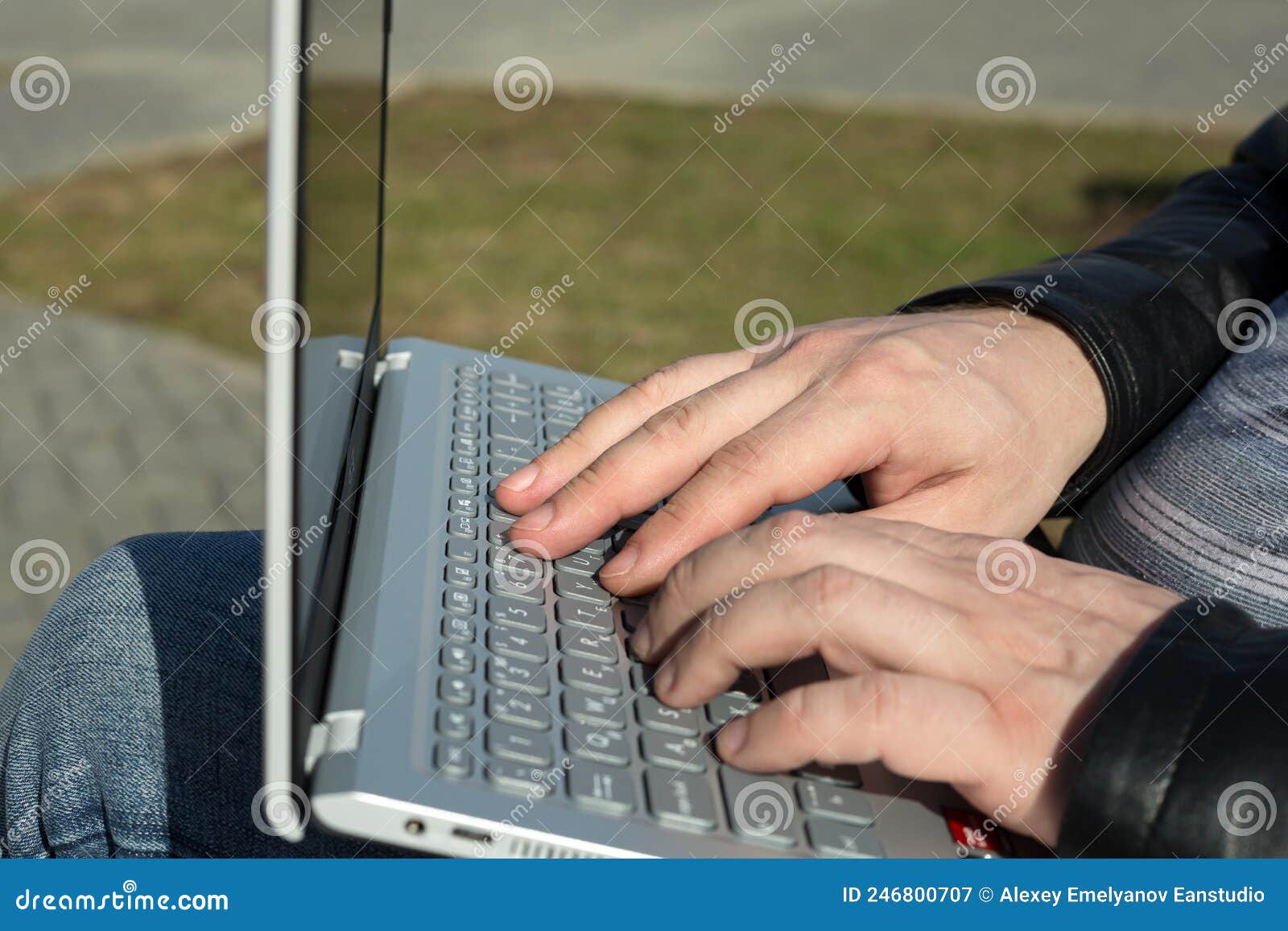 Male Hands on a Laptop Keyboard Typing Text, the Concept of a ... Male Hands on a Laptop Keyboard Typing Text, the Concept of a ...