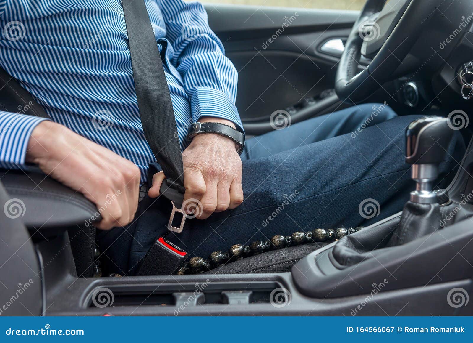 Male Hands Locking Up Safety Belt, Close Up Stock Image - Image of ...