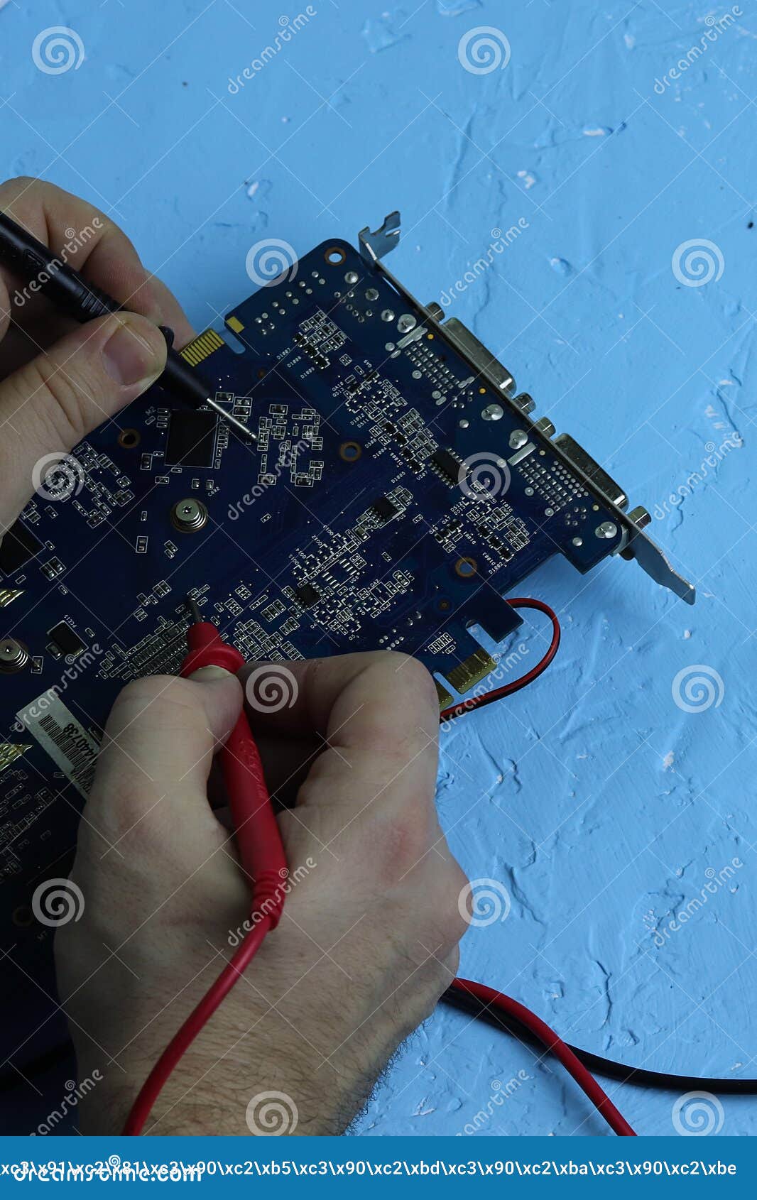 Male Hands Repair an Electronic Device Using Multimetr, Measuring the ...