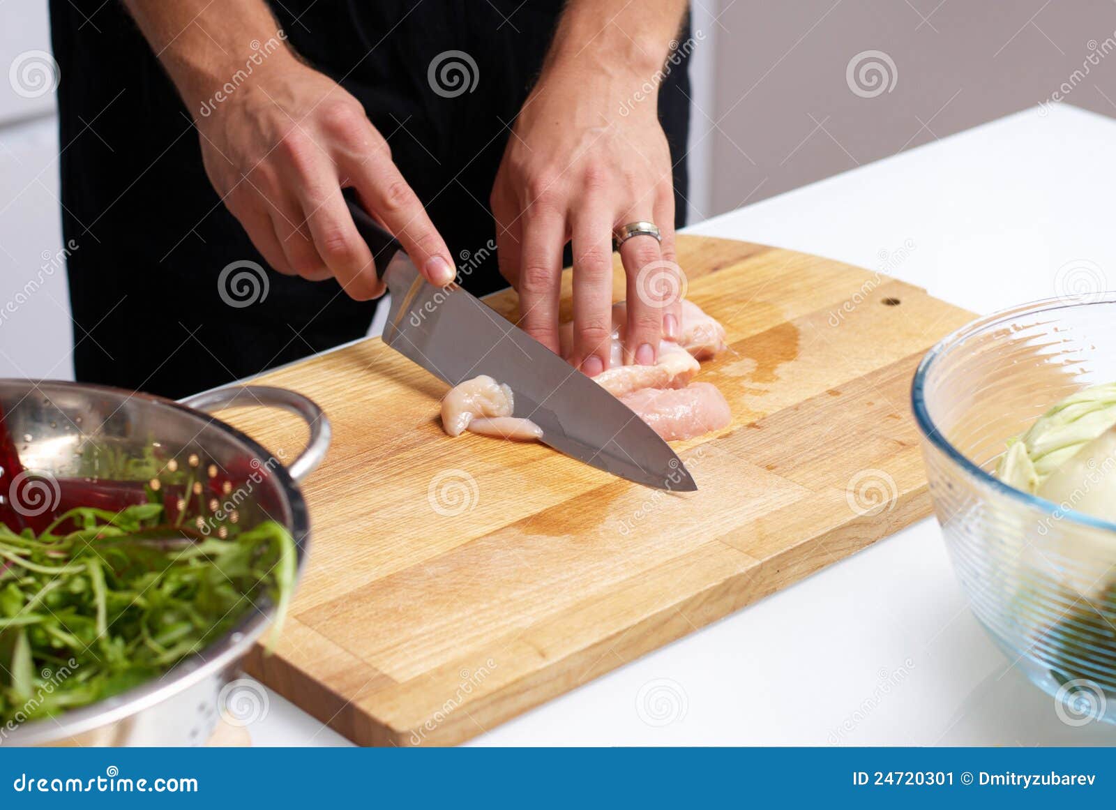 Male hands slicing chicken stock image. Image of body - 24720301