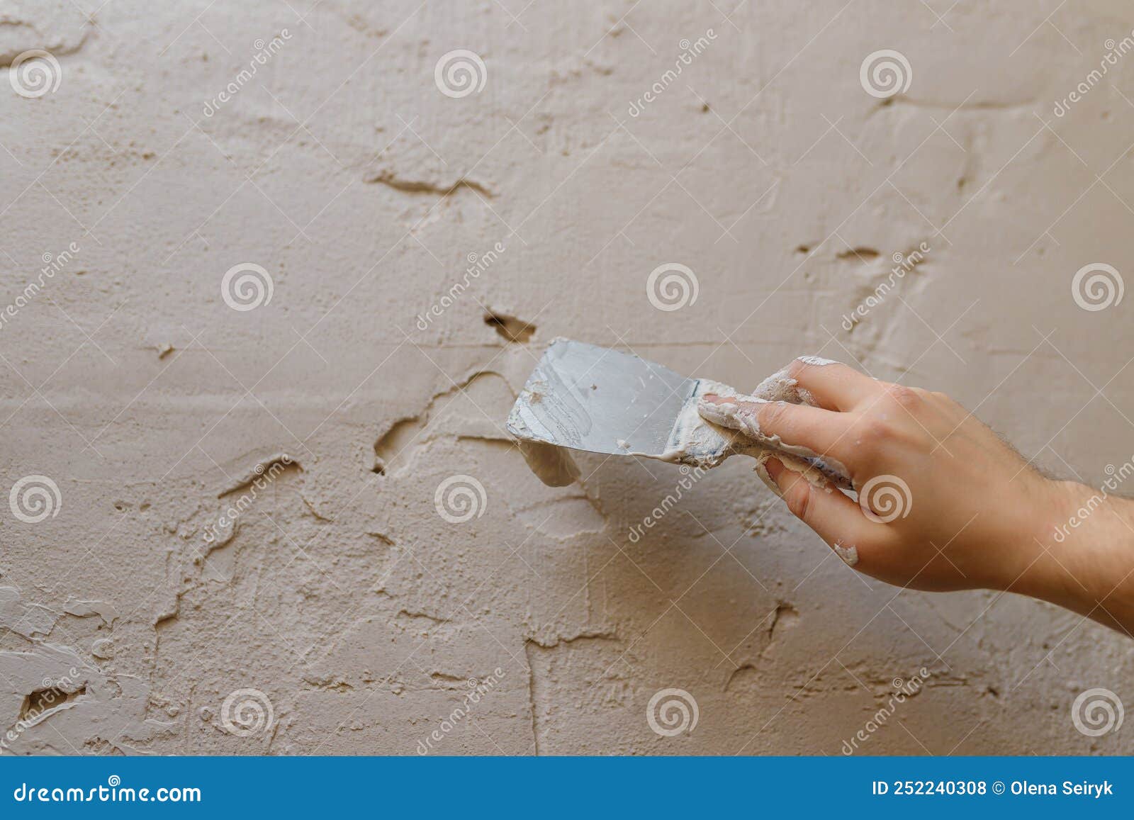 Male Hands with Spatula Using Putty for Wall, Builder Making Overhaul ...