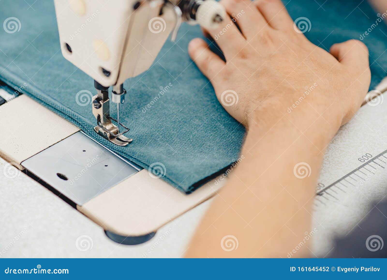 Hands Of A Tailor Seamstress At Work In The Shop For A Sewing Machine ...