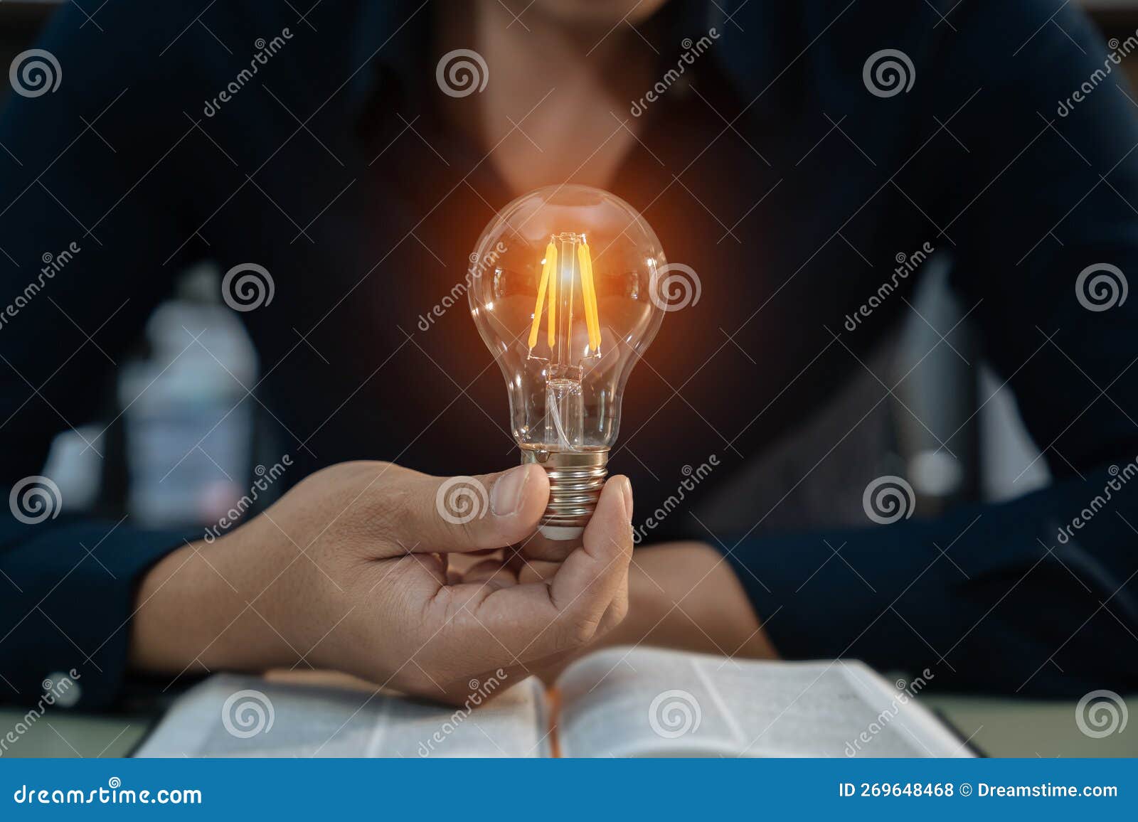 Male Hands Touching To Light Bulb Which Have Mechanical Gear Inside on ...