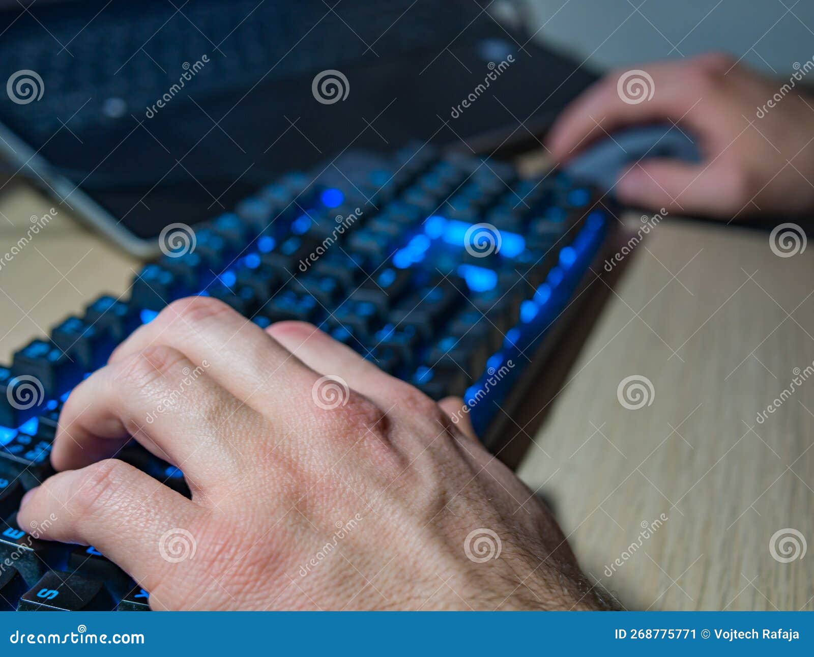 Male Hands Typing on Backlit Keyboard while Working at Night Stock ...