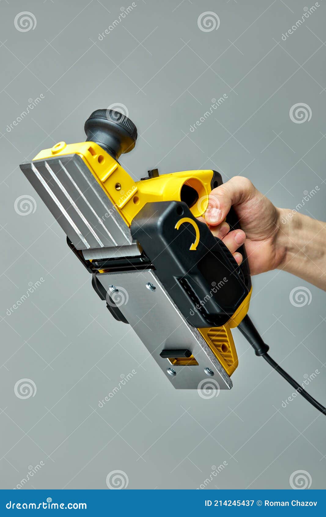 Male Hands Using Portable Electric Hand Planer Isolated on Gray Studio ...