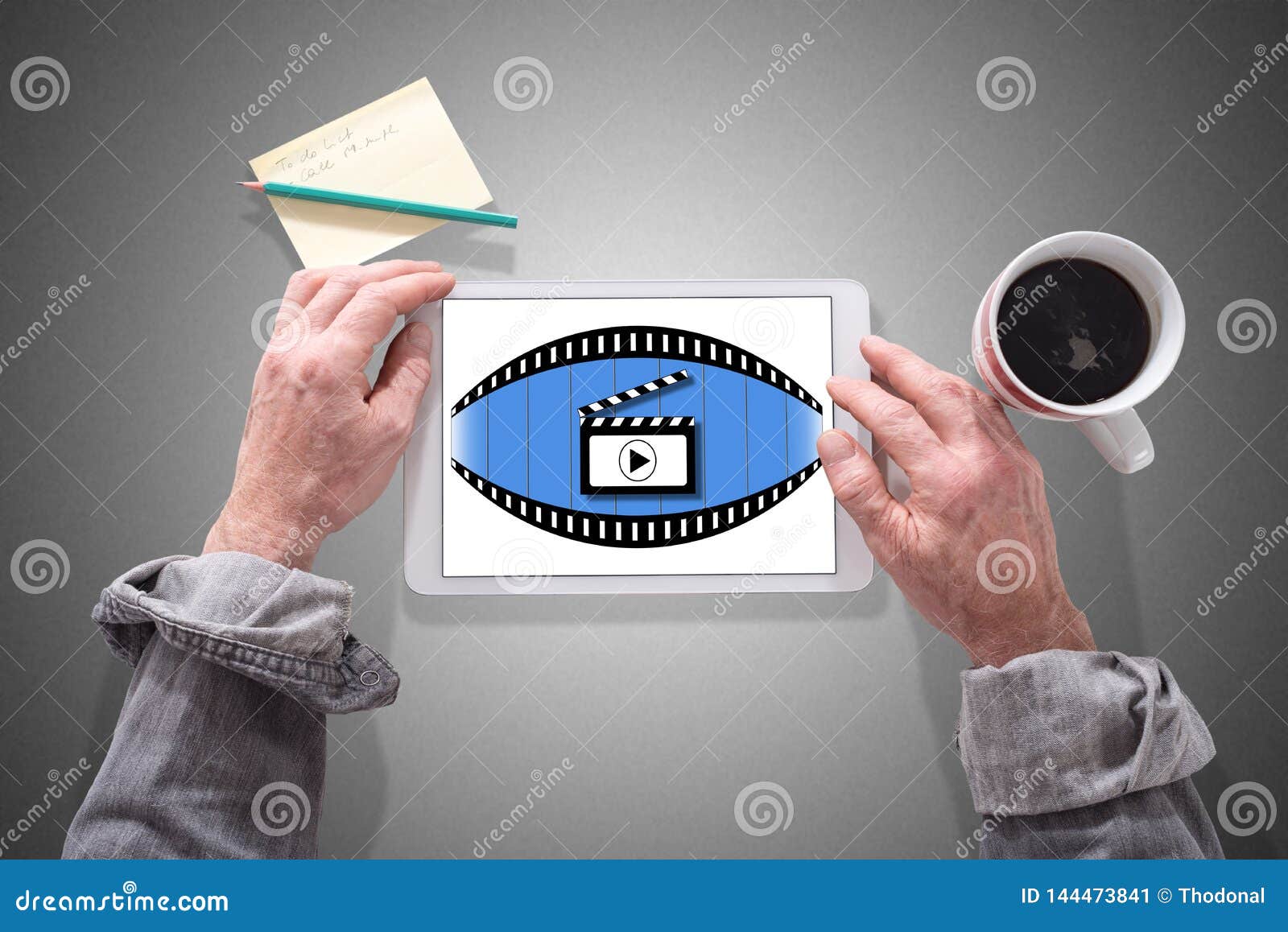 Cinema concept on a tablet stock image. Image of cinema - 144473841