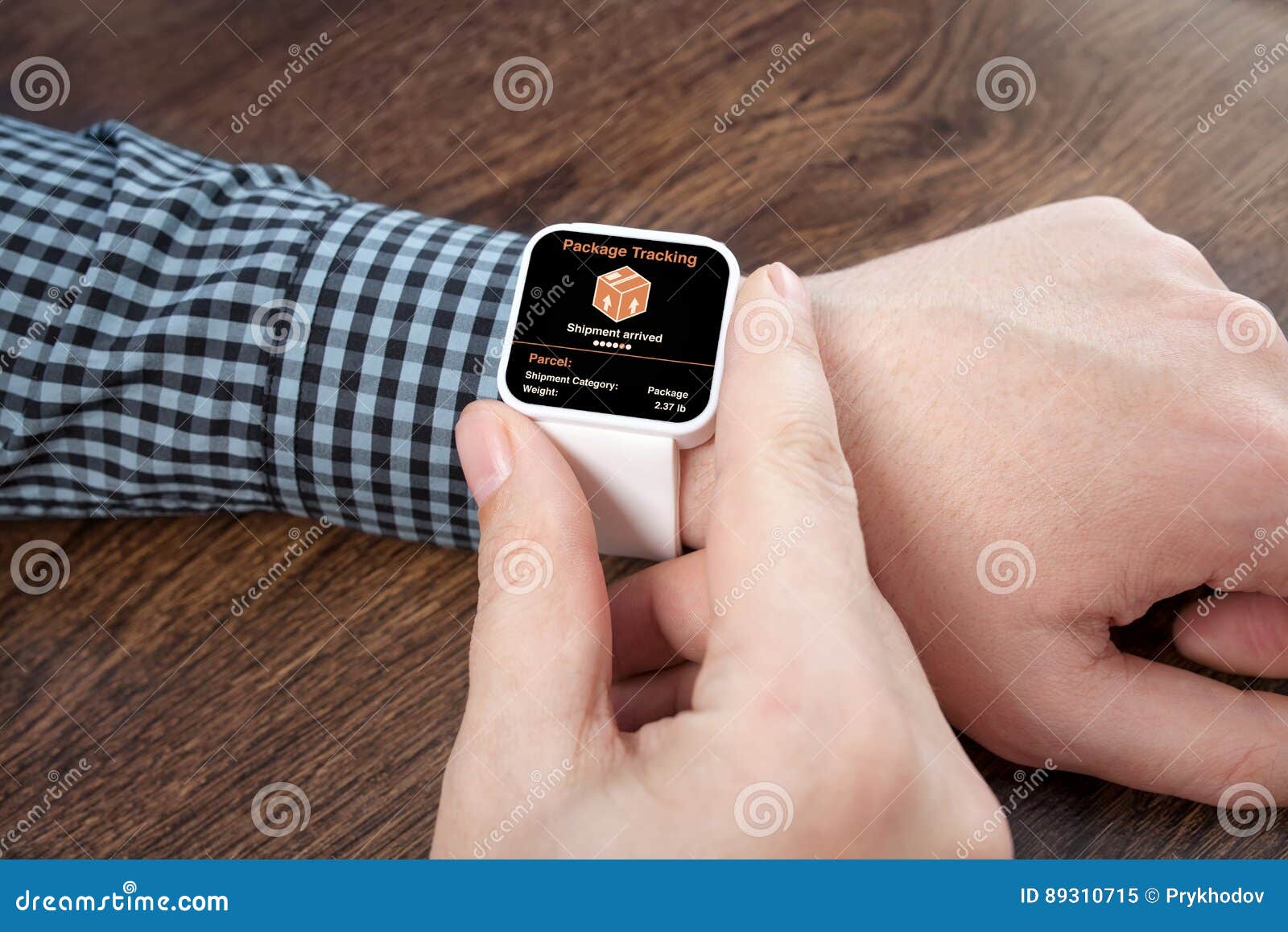Male Hands with White Smartwatch App Package Tracking Screen Stock ...
