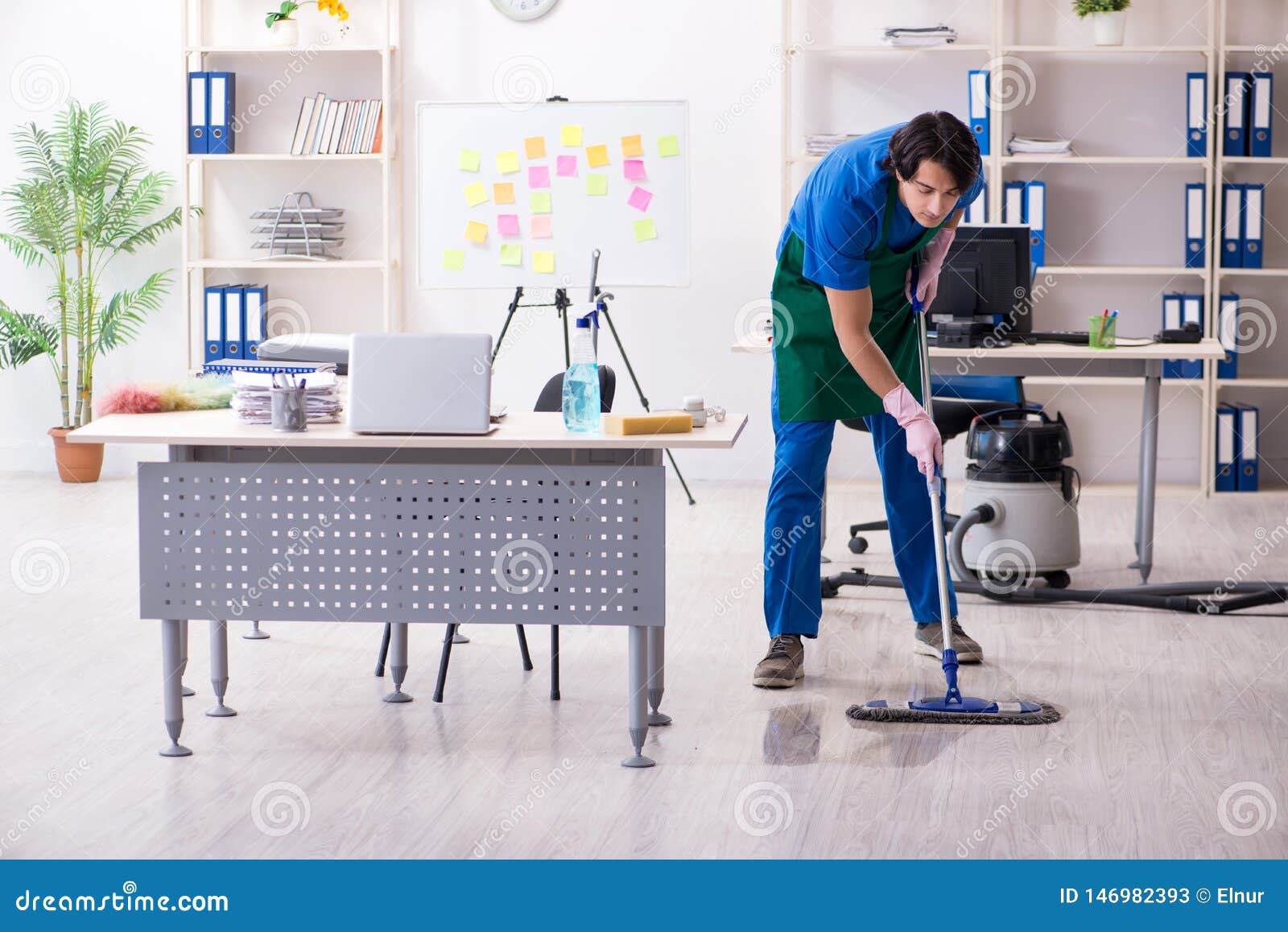 The Male Handsome Professional Cleaner Working in the Office Stock ...