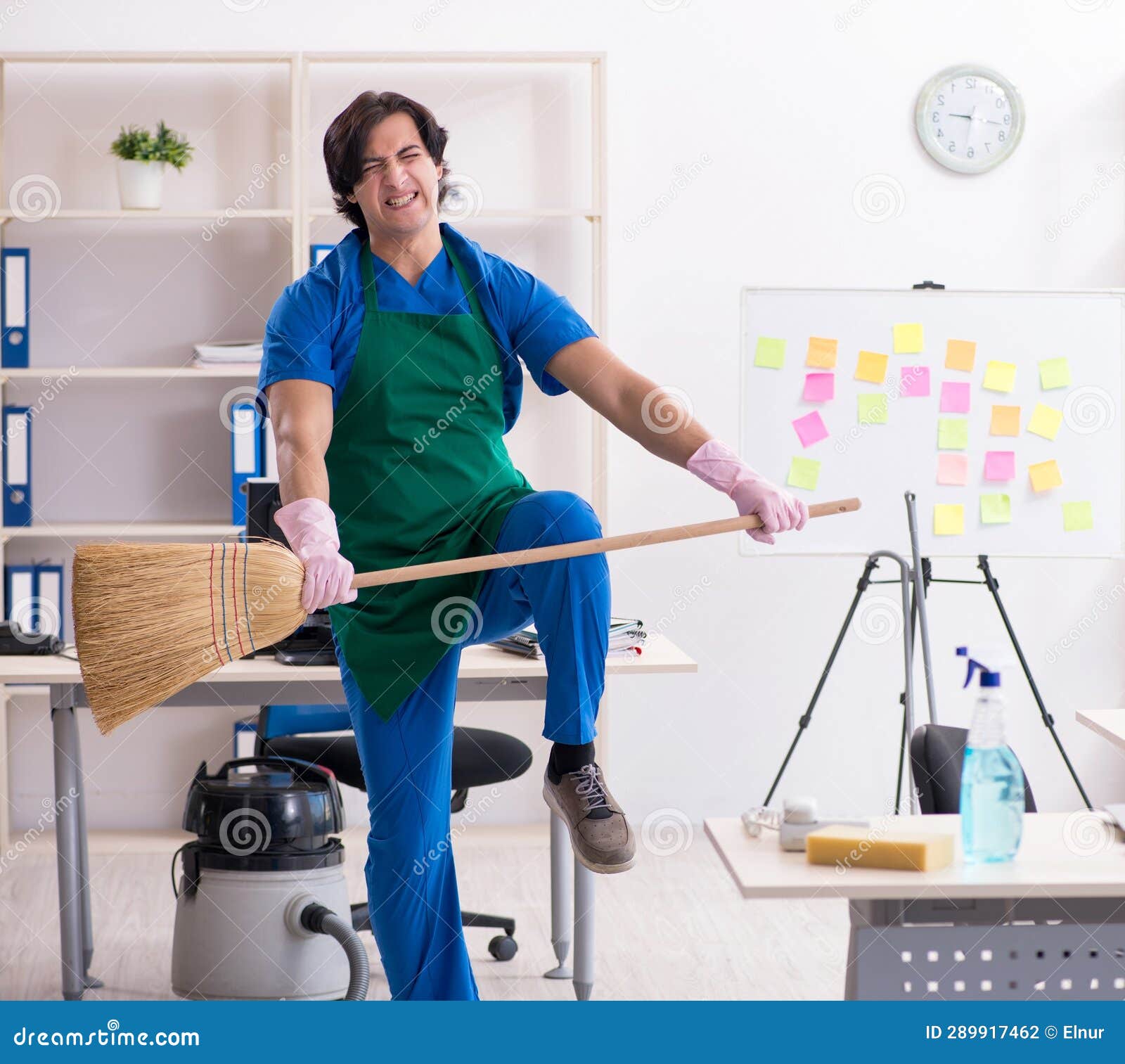 Male Handsome Professional Cleaner Working in the Office Stock Photo ...