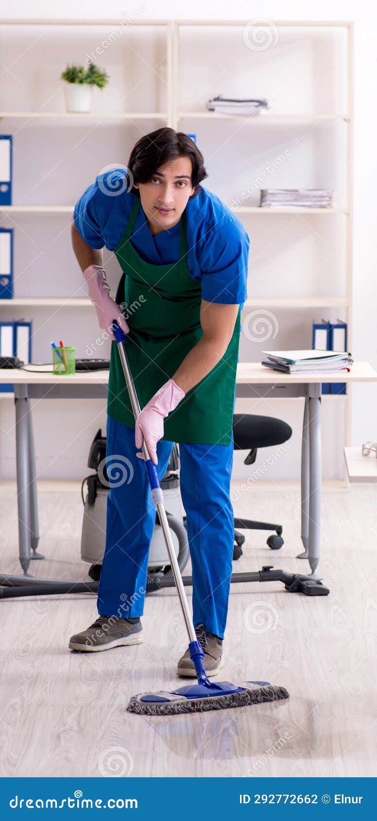 Male Handsome Professional Cleaner Working in the Office Stock Photo ...