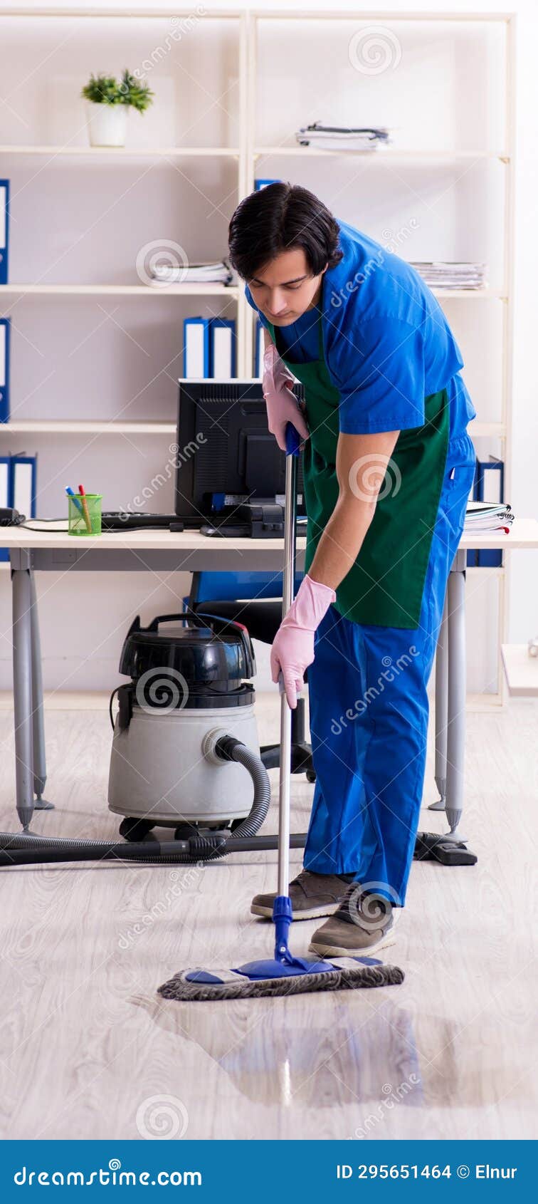 Male Handsome Professional Cleaner Working in the Office Stock Photo ...